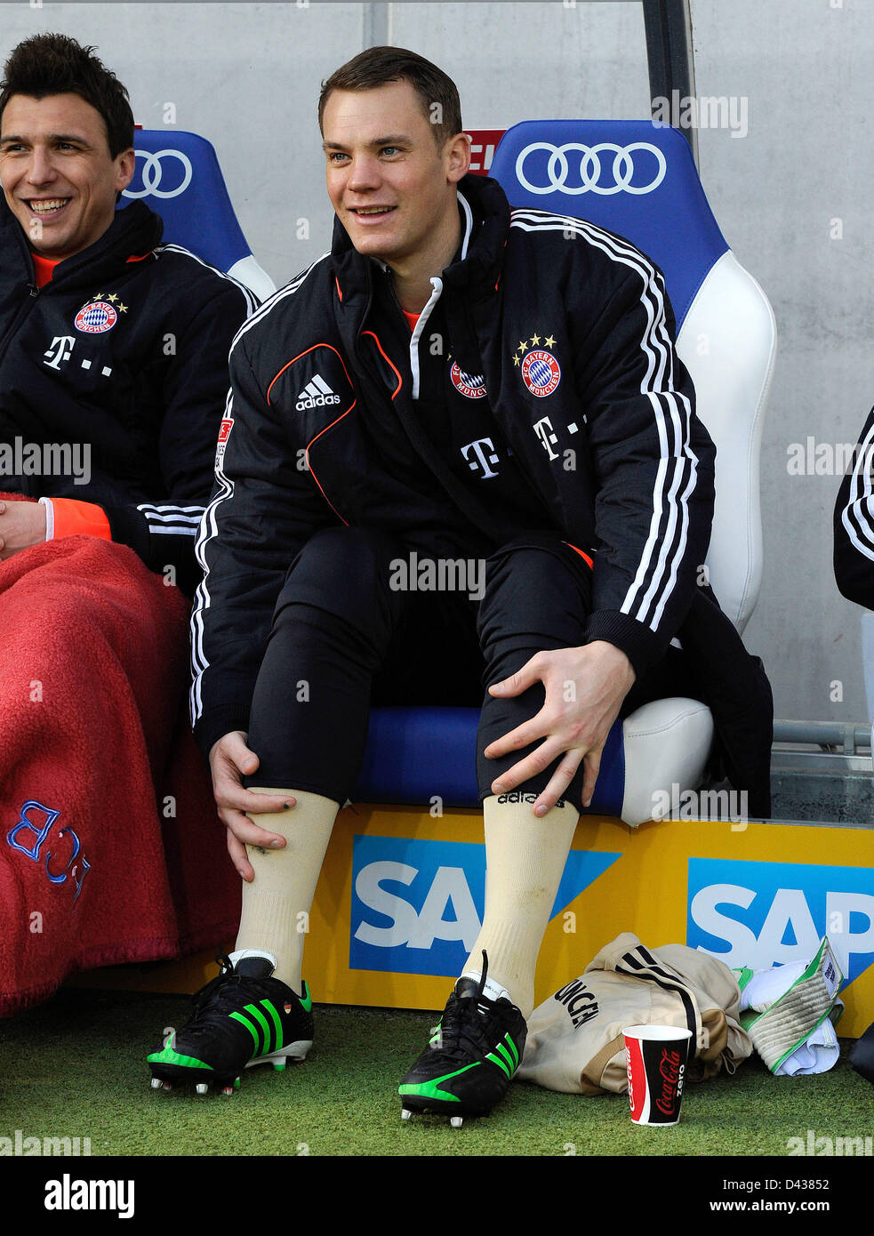Munich's goalkeeper Manuel Neuer sits on the bench during the German ...