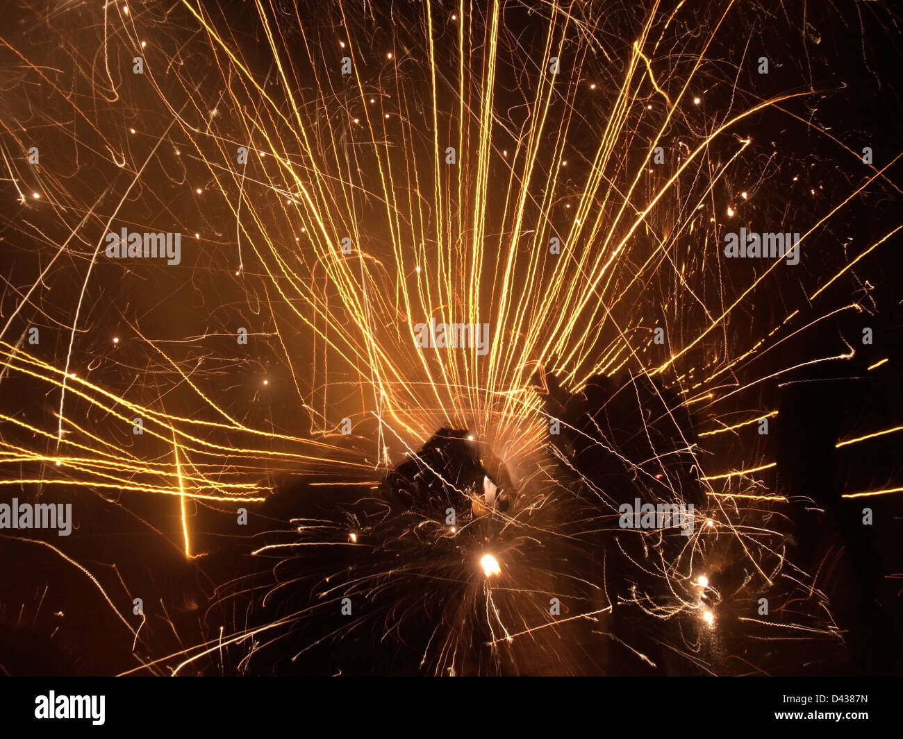 a swinging colorful pyrotechnic effect in dark back Stock Photo - Alamy