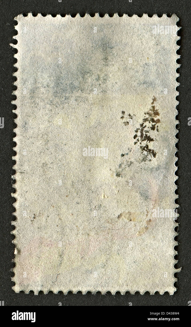 The reverse side of a postage stamp Stock Photo - Alamy