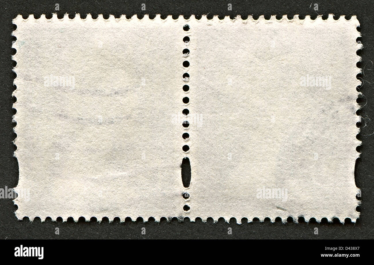 The reverse side of a postage stamp Stock Photo - Alamy