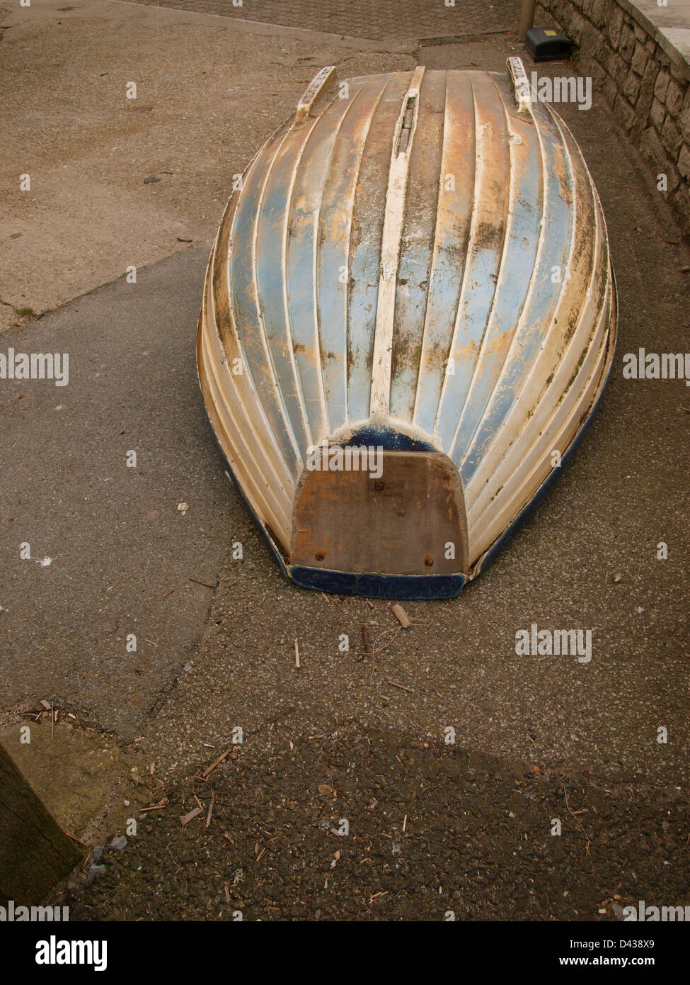 Upturned boat on dry land Stock Photo - Alamy