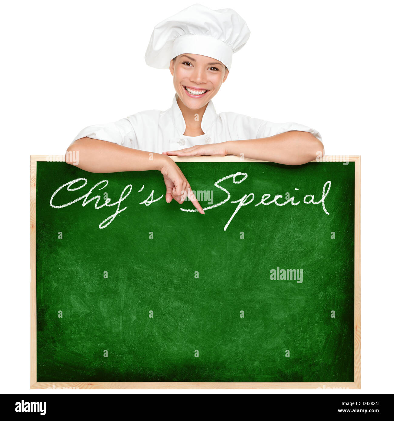 Portrait of happy young mixed race woman showing blank chef's special ...