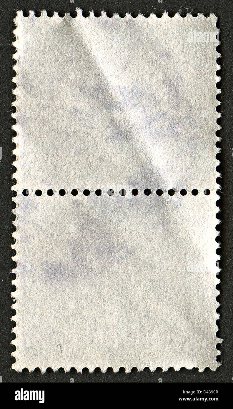 The reverse side of a postage stamp Stock Photo - Alamy