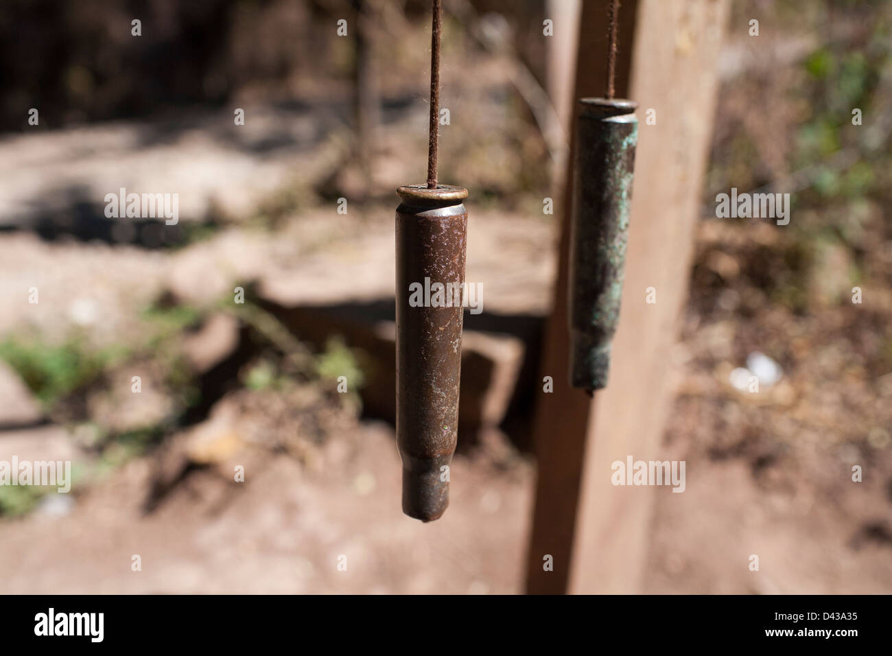 Used spent bullet casings strung up as a hand rail on display at the ...