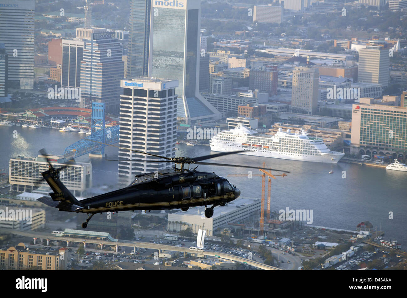 A CBP helicopter performs aerial surveillance over a stadium during an ...