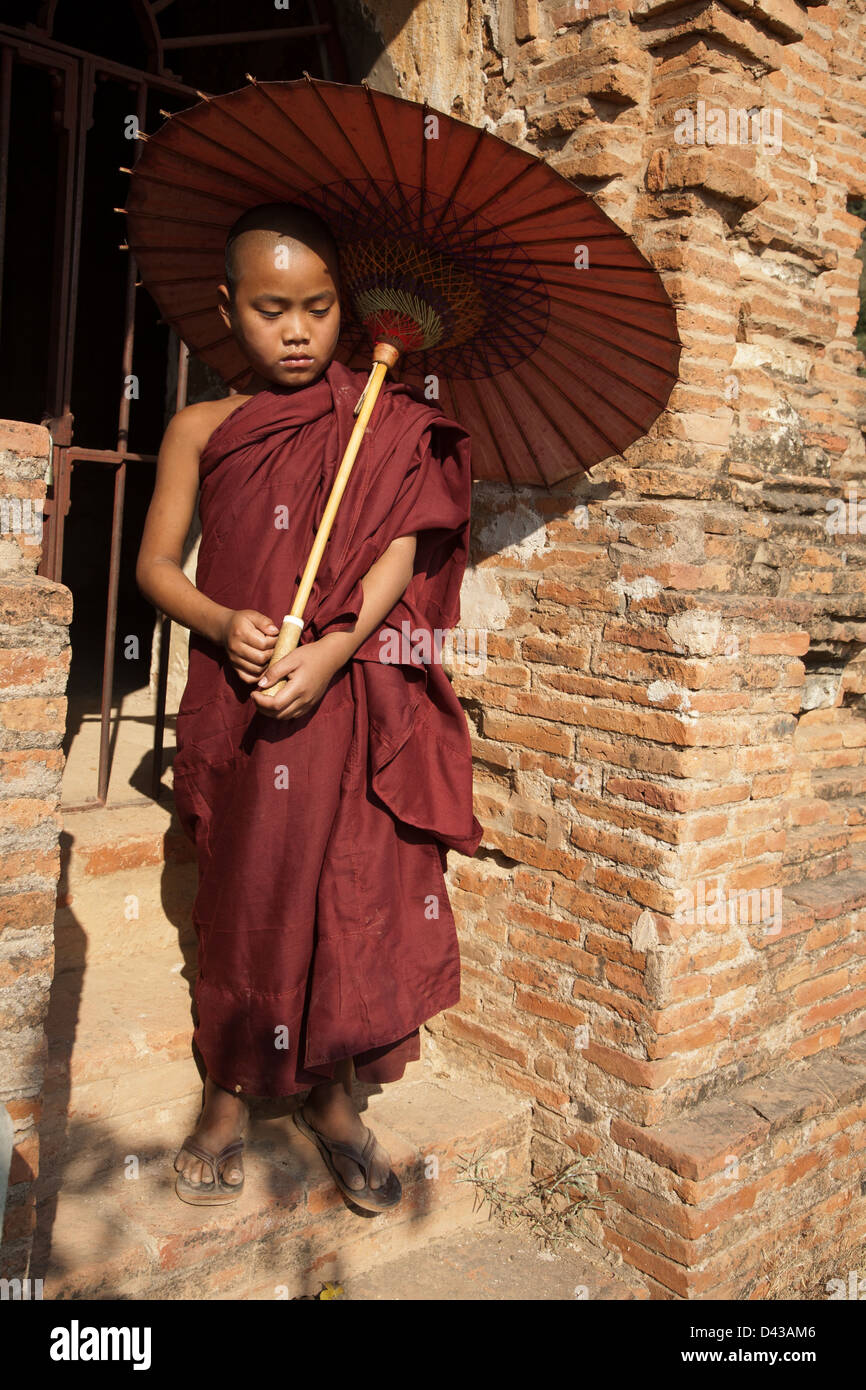 Novice monks with parasol hi-res stock photography and images - Alamy