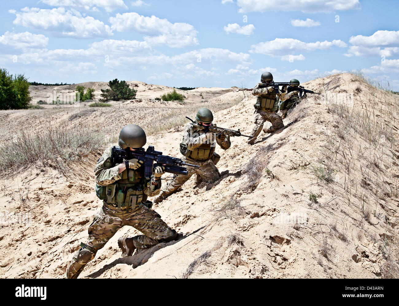Squad in action Stock Photo - Alamy