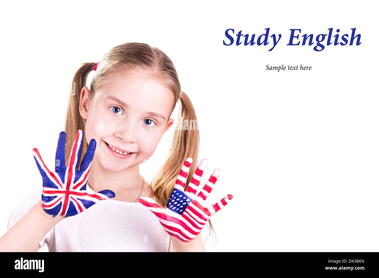 American and English flags on child's hands. Learning English language ...