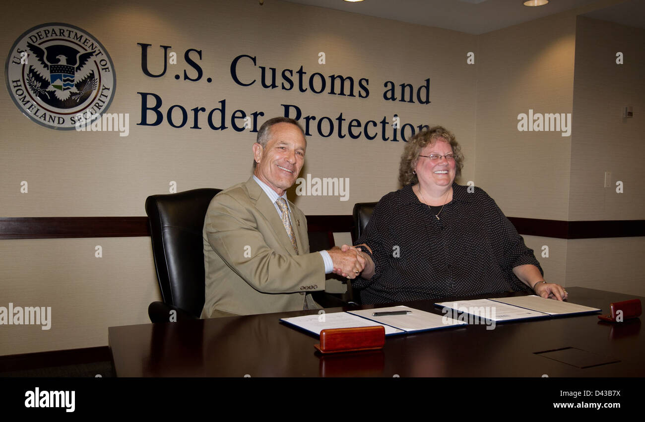 CBP Commissioner Alan Bersin and NTEU President Colleen Kelley sign a ...