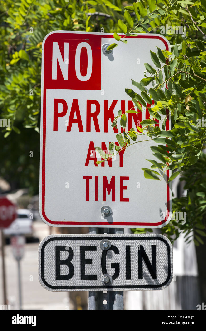 Amusing no parking at any time sign Stock Photo - Alamy