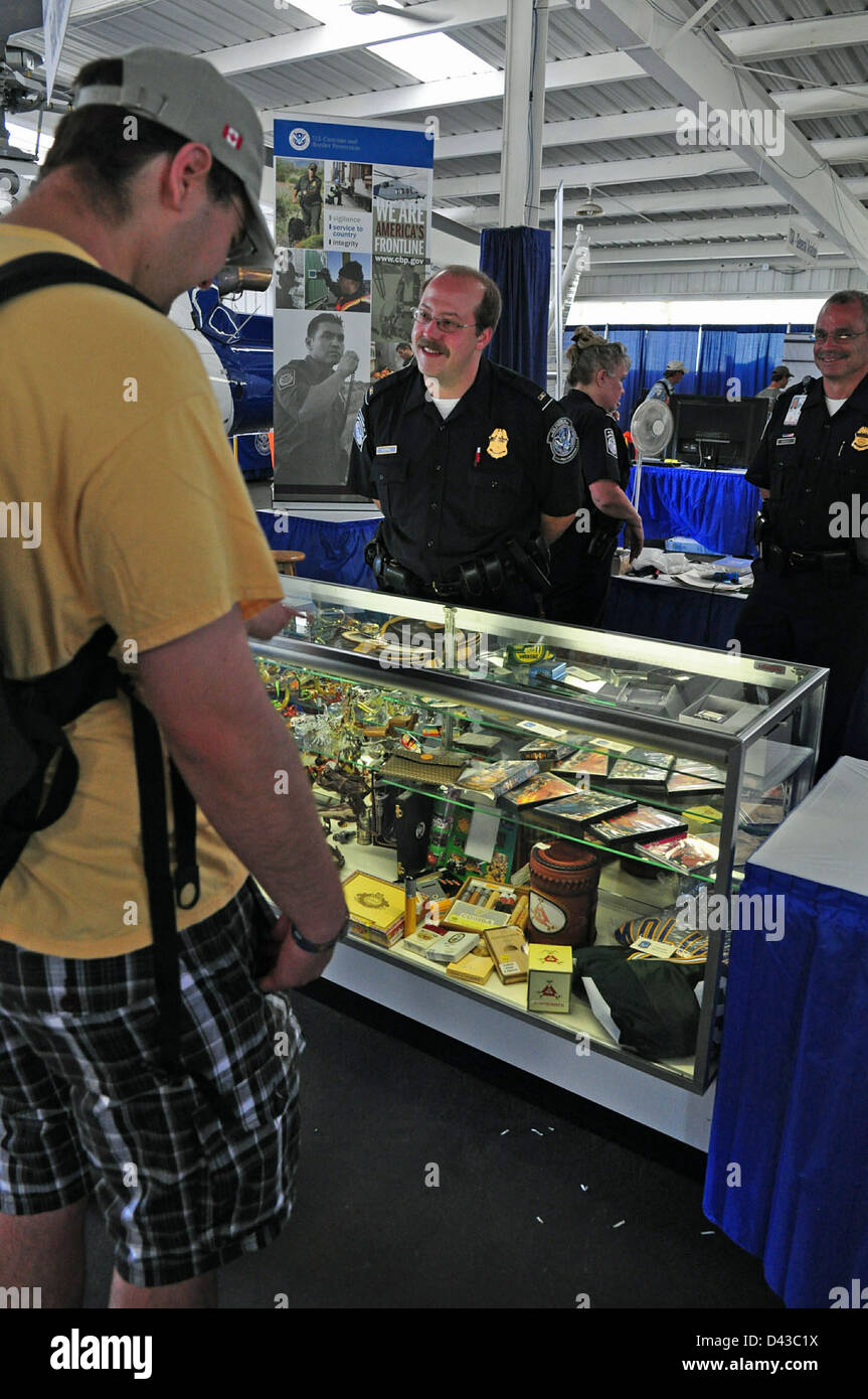 CBP officers engage with visitors at the Experimental Aircraft ...