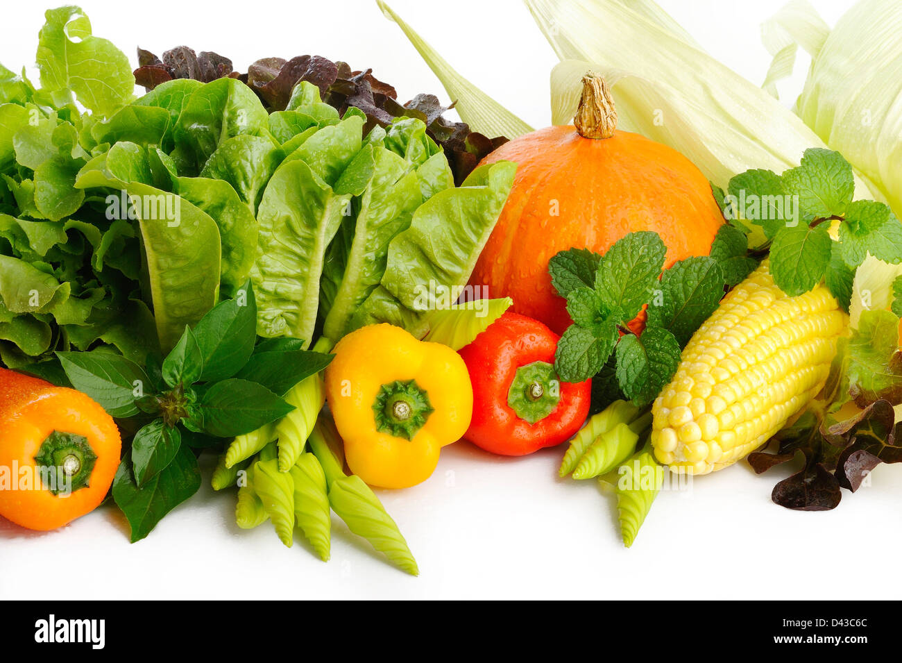 fresh vegetable with leaves on white background Stock Photo - Alamy