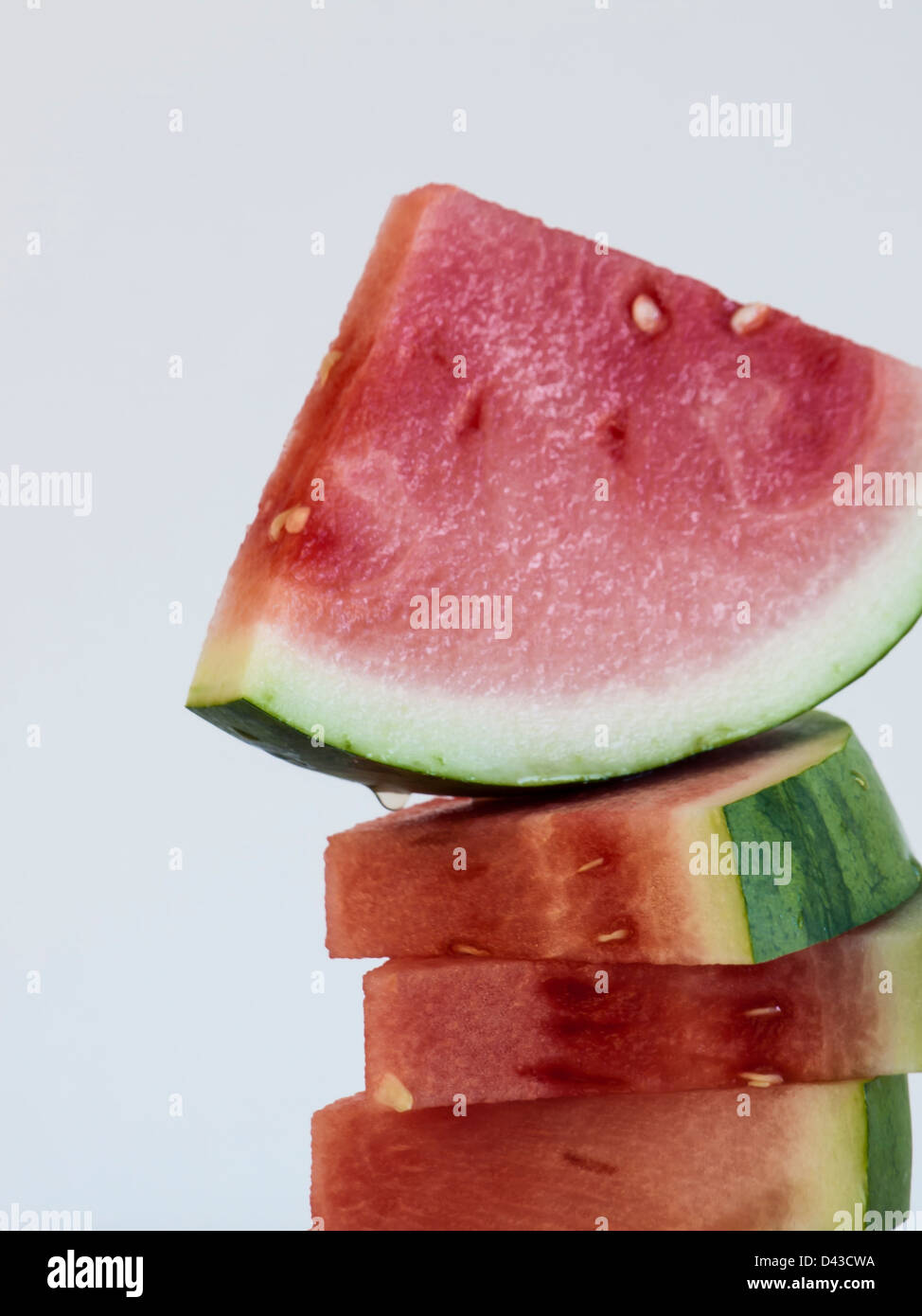 Fresh slices of watermelon on white background Stock Photo - Alamy