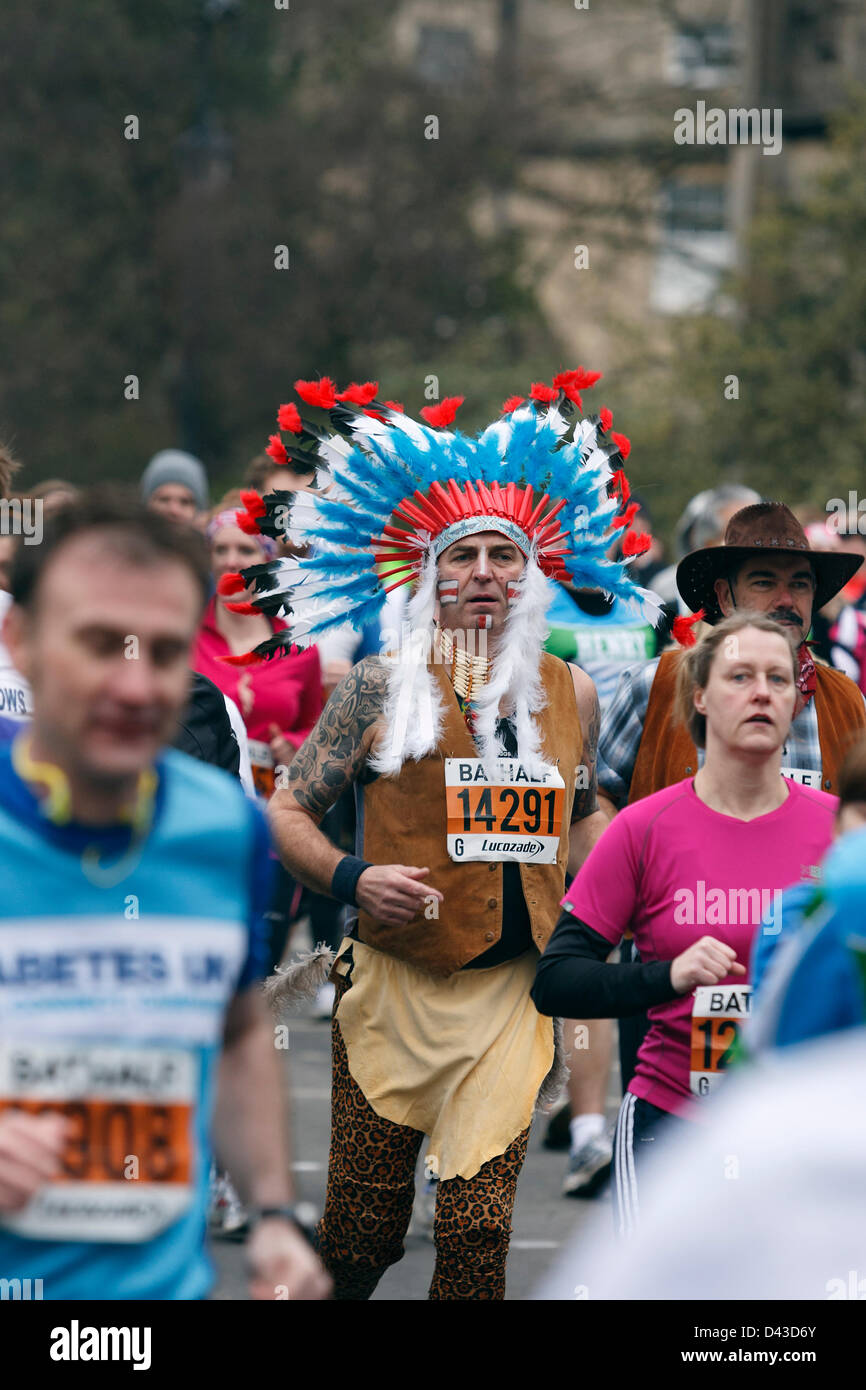 A man is photographed in fancy dress taking part in and running in the ...