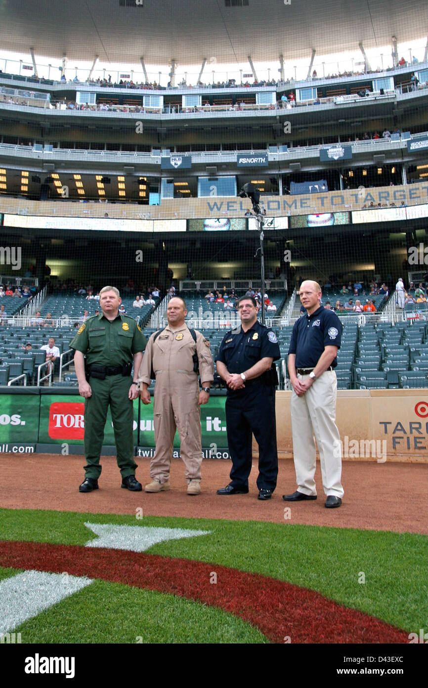 This image shows two U.S. Customs and Border Protection (CBP) agents ...