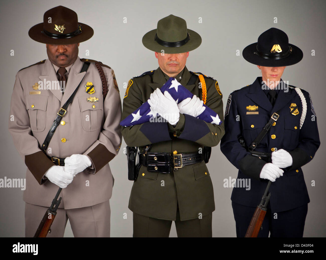 U.S. Customs and Border Protection (CBP) officers wear official ...