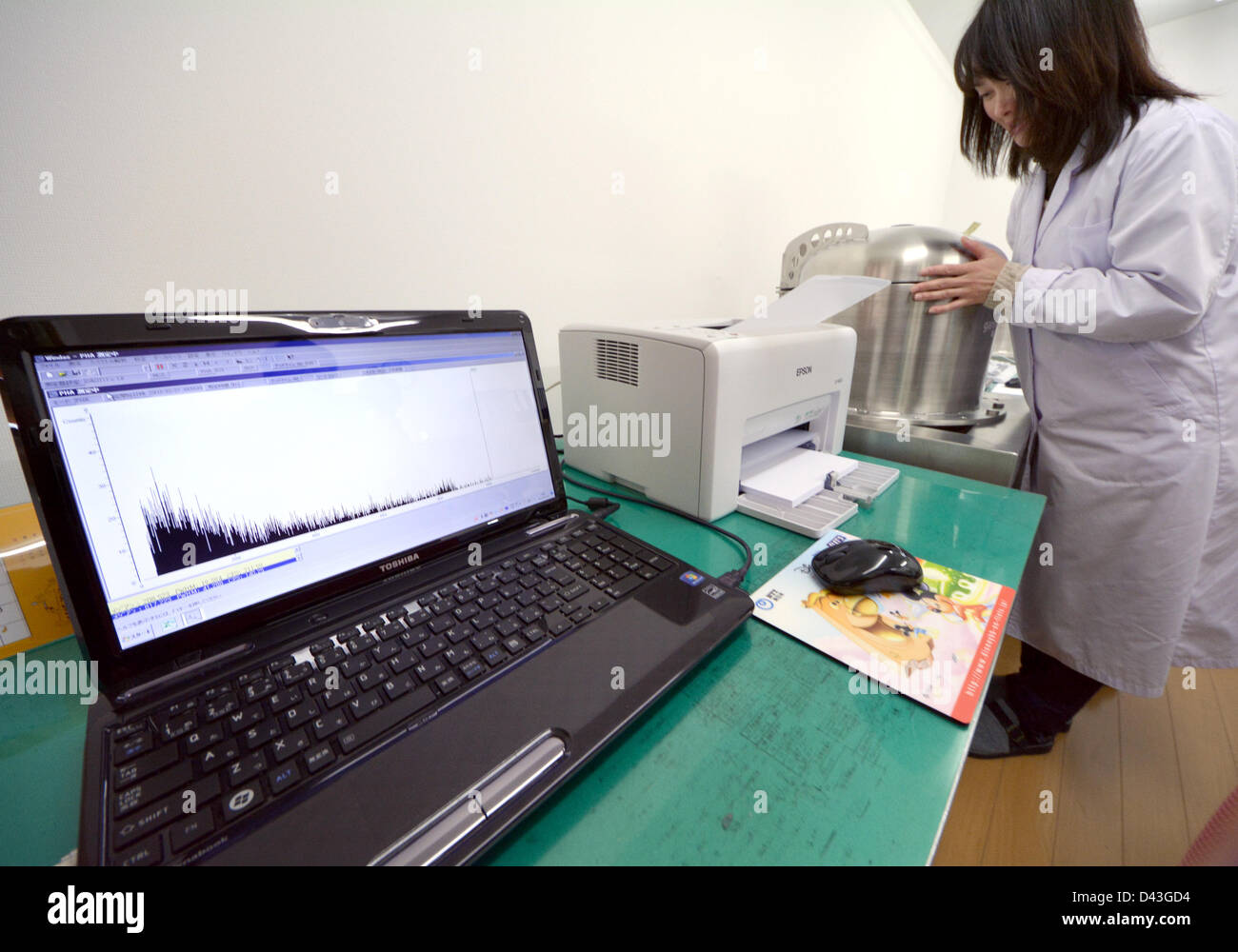 February 27, 2013, Koriyama, Japan - A lab technician works in the ...