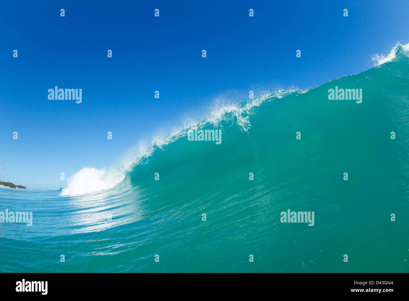 Blue Ocean Wave and Sunny Blue Sky Stock Photo - Alamy