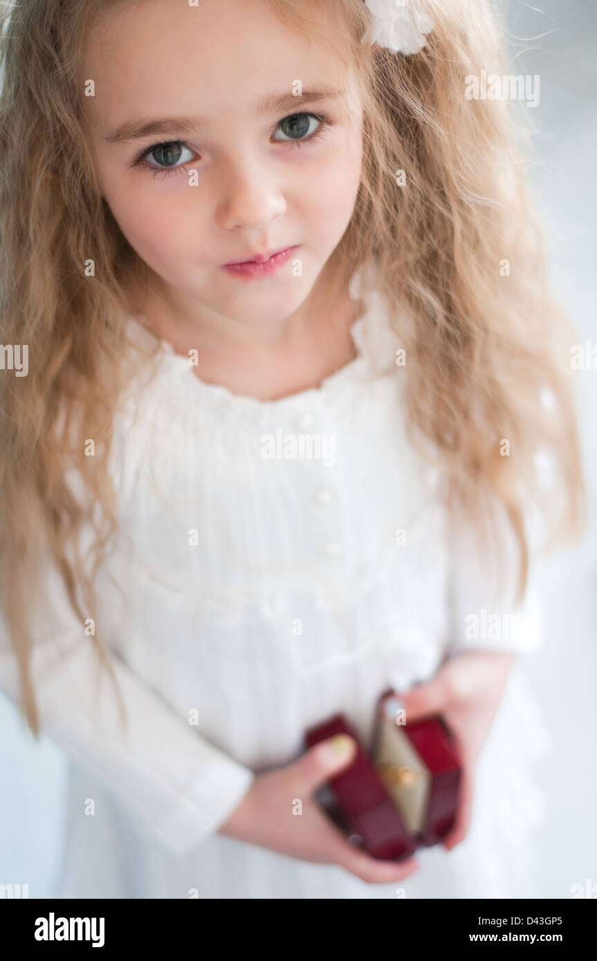 Portrait beautiful girl with small box in hands Stock Photo - Alamy