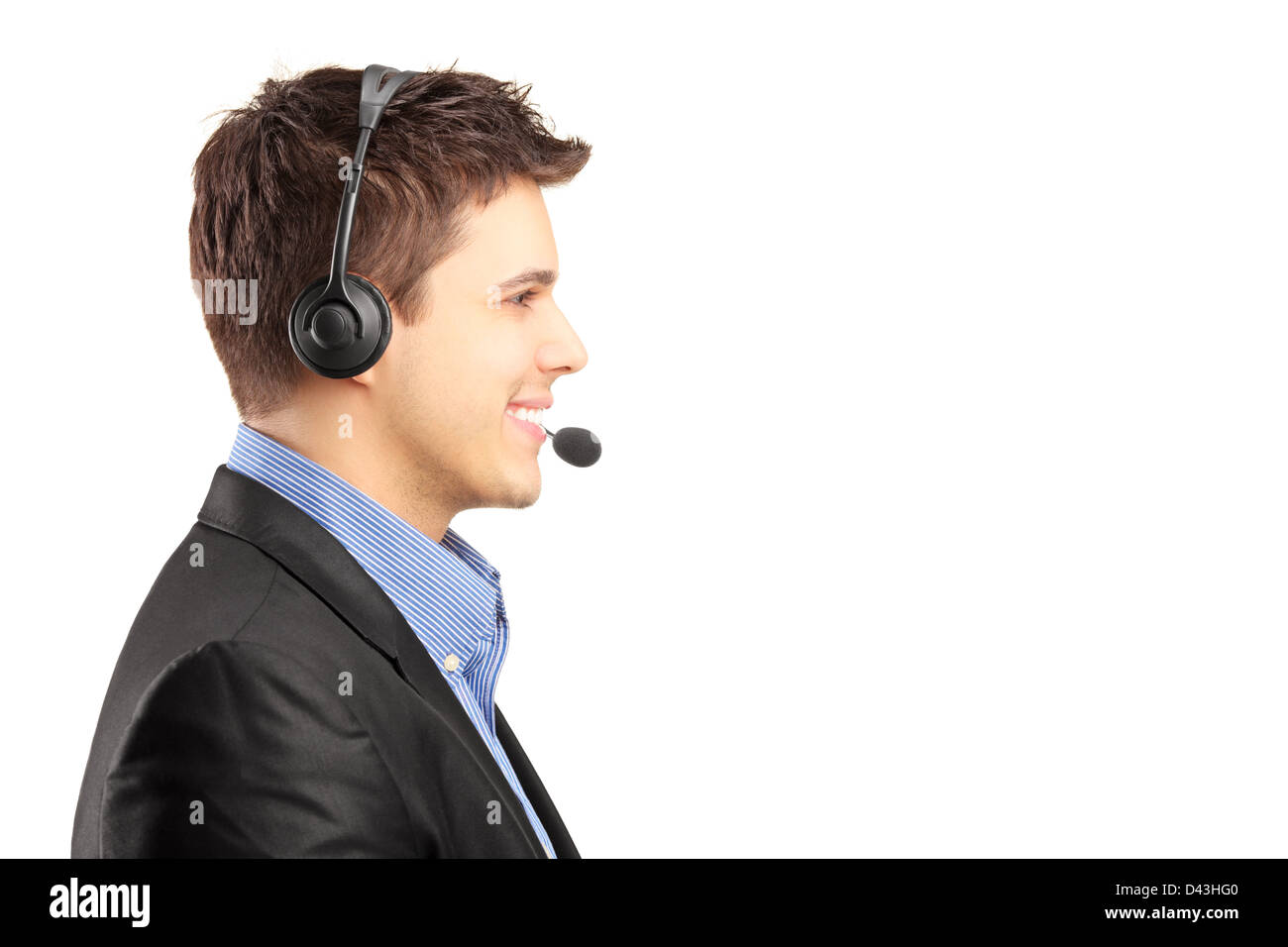 Smiling customer service employee in profile with headset on isolated ...