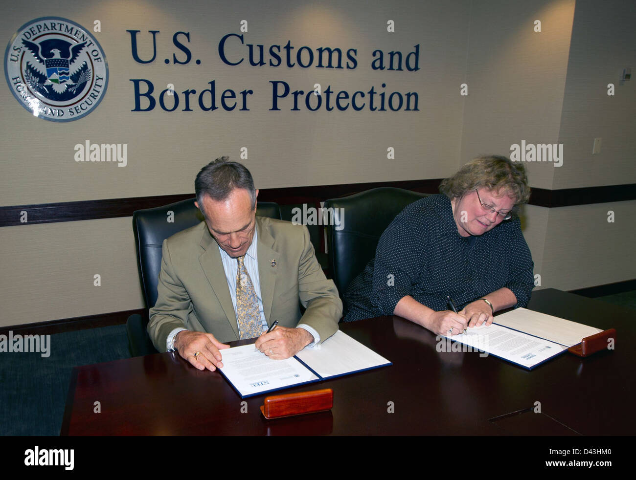 CBP Commissioner Alan Bersin and NTEU President Colleen Kelley signed a ...