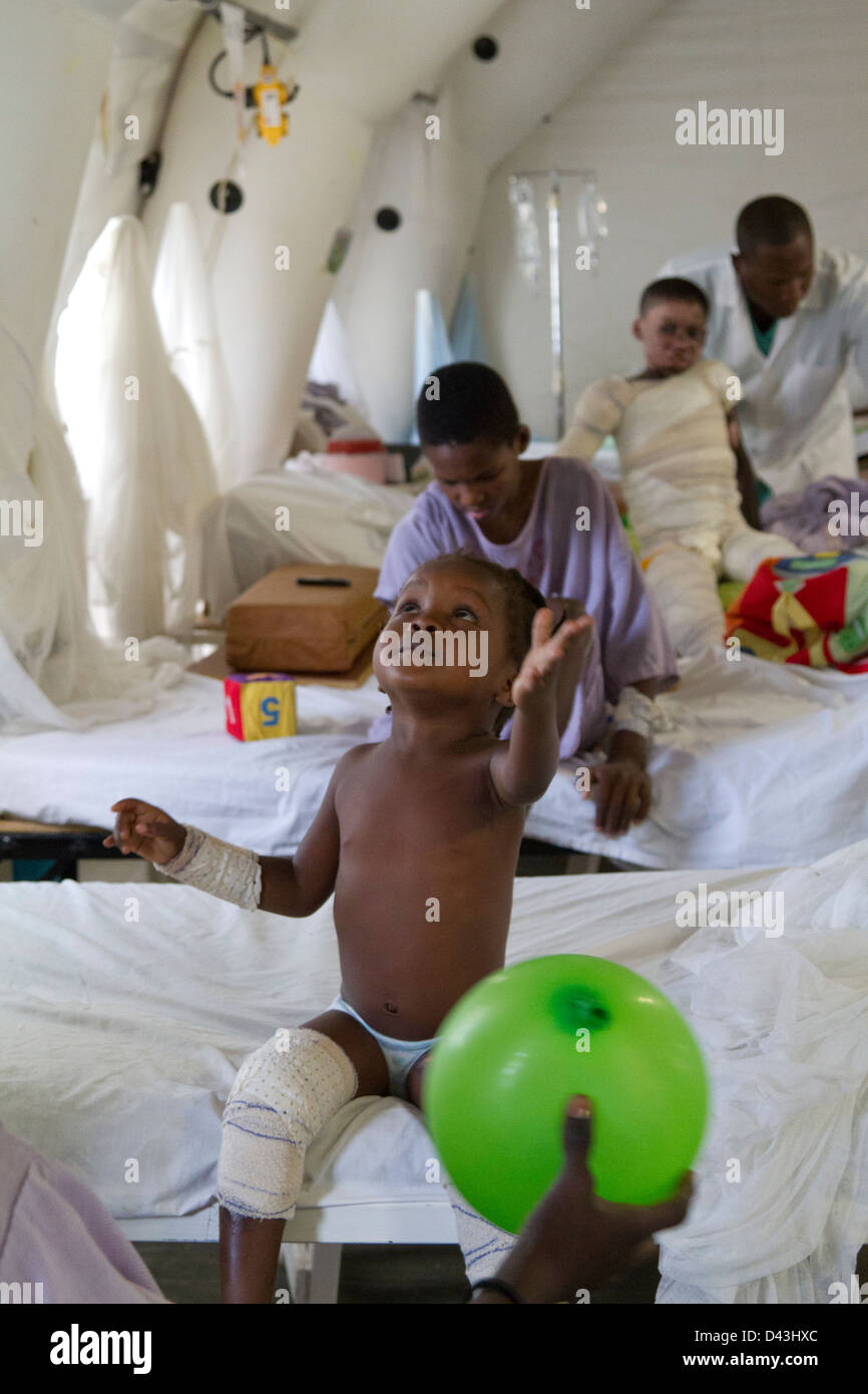 children playing with balloon in the burn unit in Drouillard Hospital ...