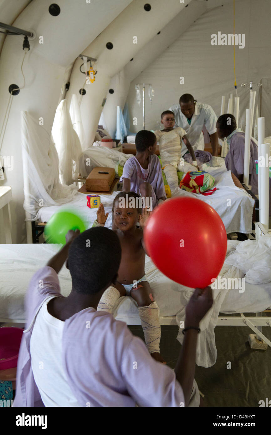 children playing with balloon in the burn unit in Drouillard Hospital ...