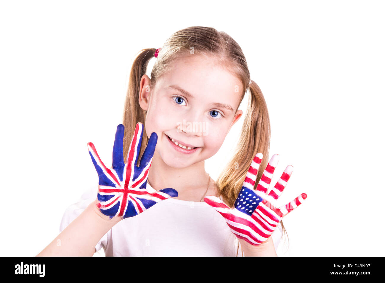 American and English flags on child's hands. Learning English language ...