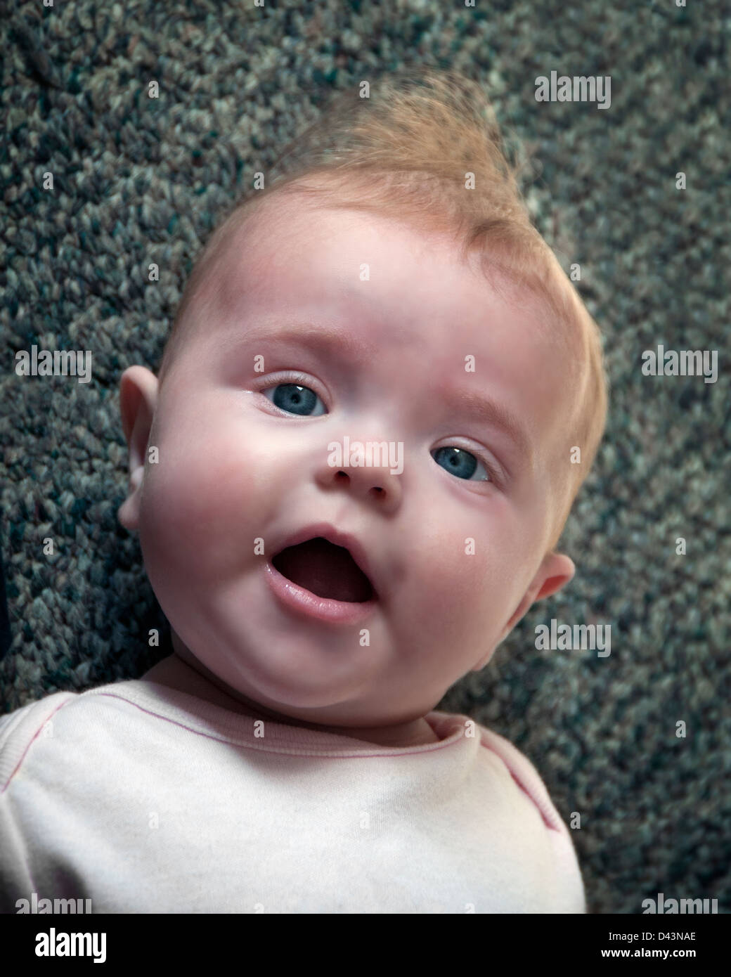 Infant with big eyes and open mouth hi-res stock photography and images ...