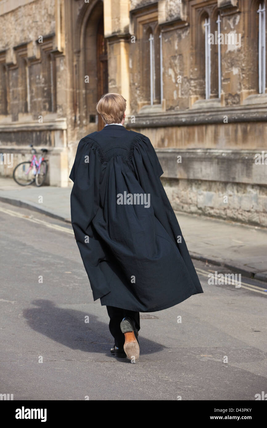 Man wearing academic dress outside Oriel College, University of Oxford, England, UK Stock Photo ...
