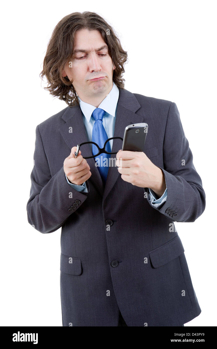 young business man looking worried to his phone, isolated Stock Photo ...