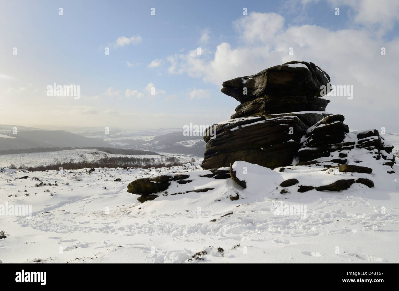 Mother Cap rock formation in the snow - Peak District, England, UK ...