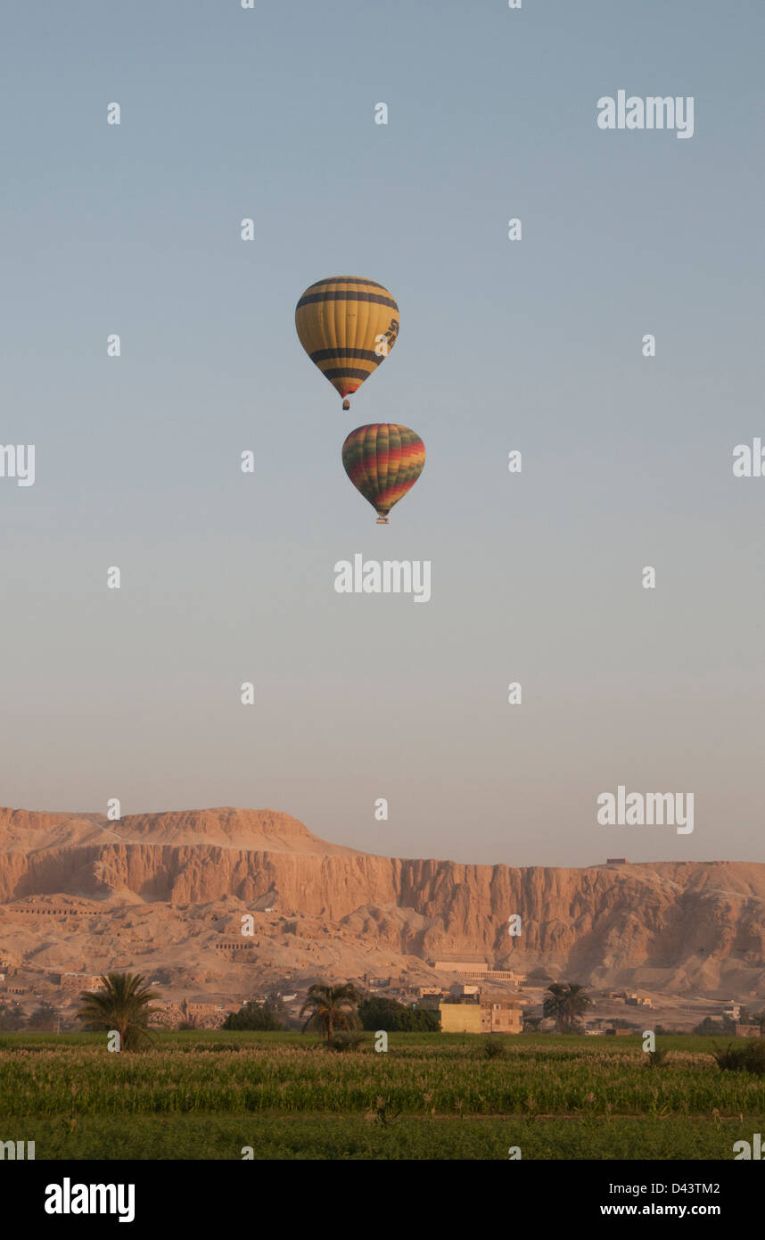 Hot air balloon hovering over east bank of Luxor, Egypt Stock Photo - Alamy