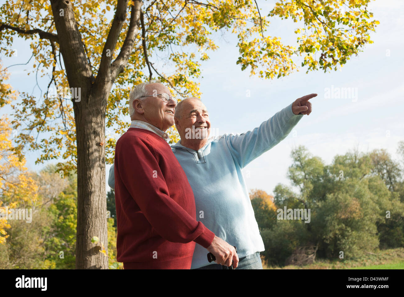Two old men talking in park hi-res stock photography and images - Alamy
