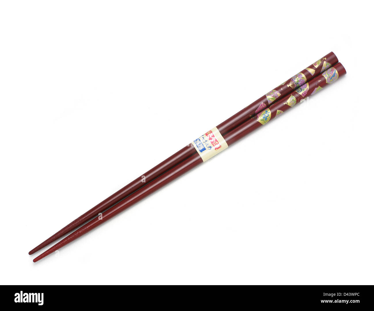Pair of red chop sticks cut out white background Stock Photo - Alamy