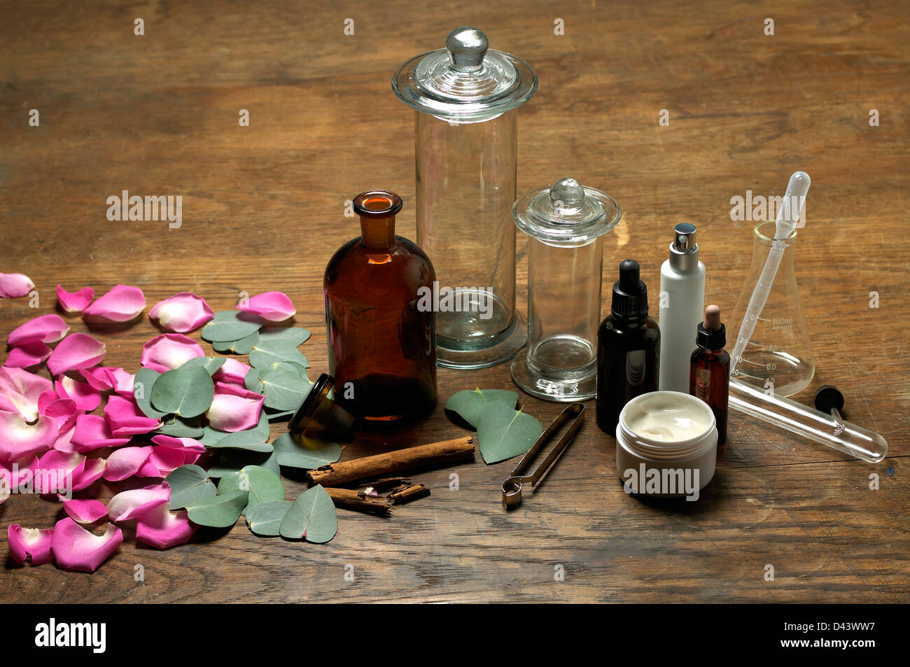 Group of empty prescription bottles with scattered petals cut out white ...