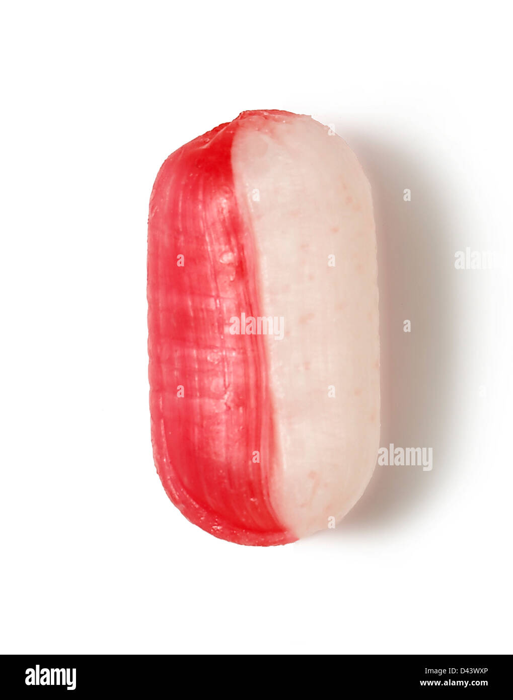 Red and white sweet cut out white background Stock Photo - Alamy