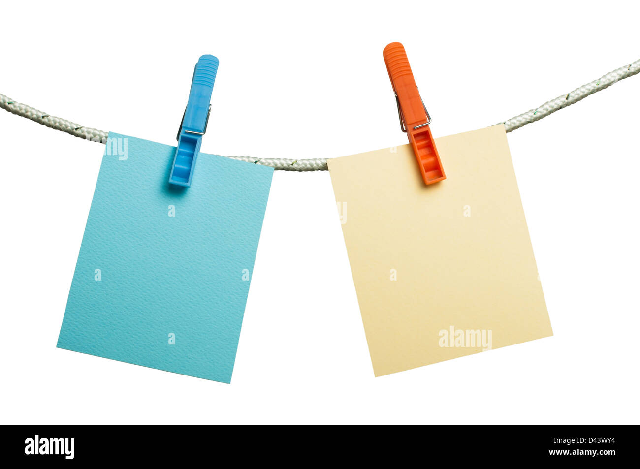 Note papers hooked on a rope. White isolated studio shot Stock Photo ...