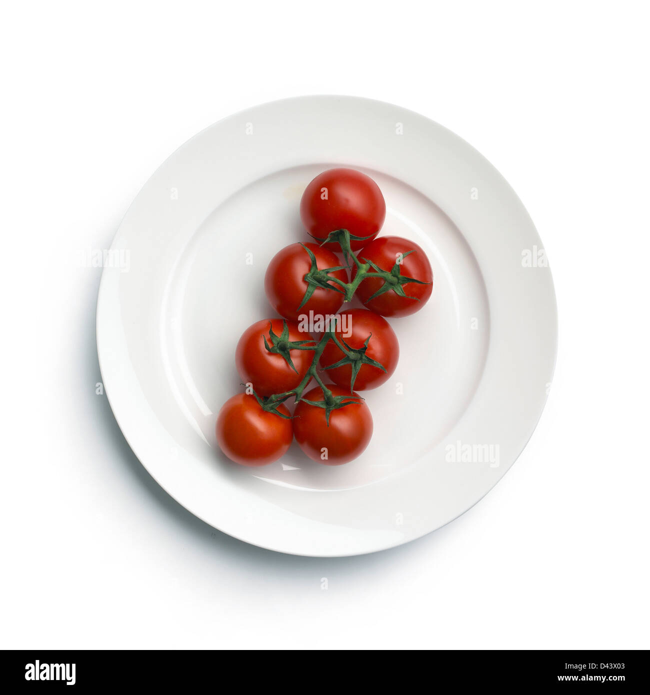 Cherry tomatoes cut out white background Stock Photo - Alamy