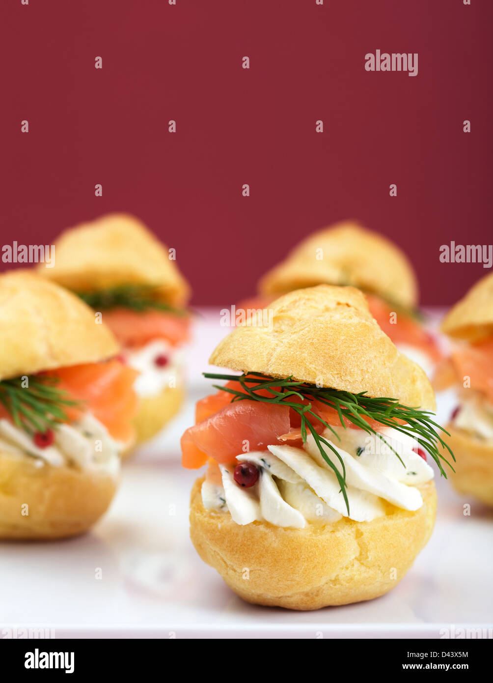 Savoury choux puffs filled with smoked salmon and cream cheese Stock ...