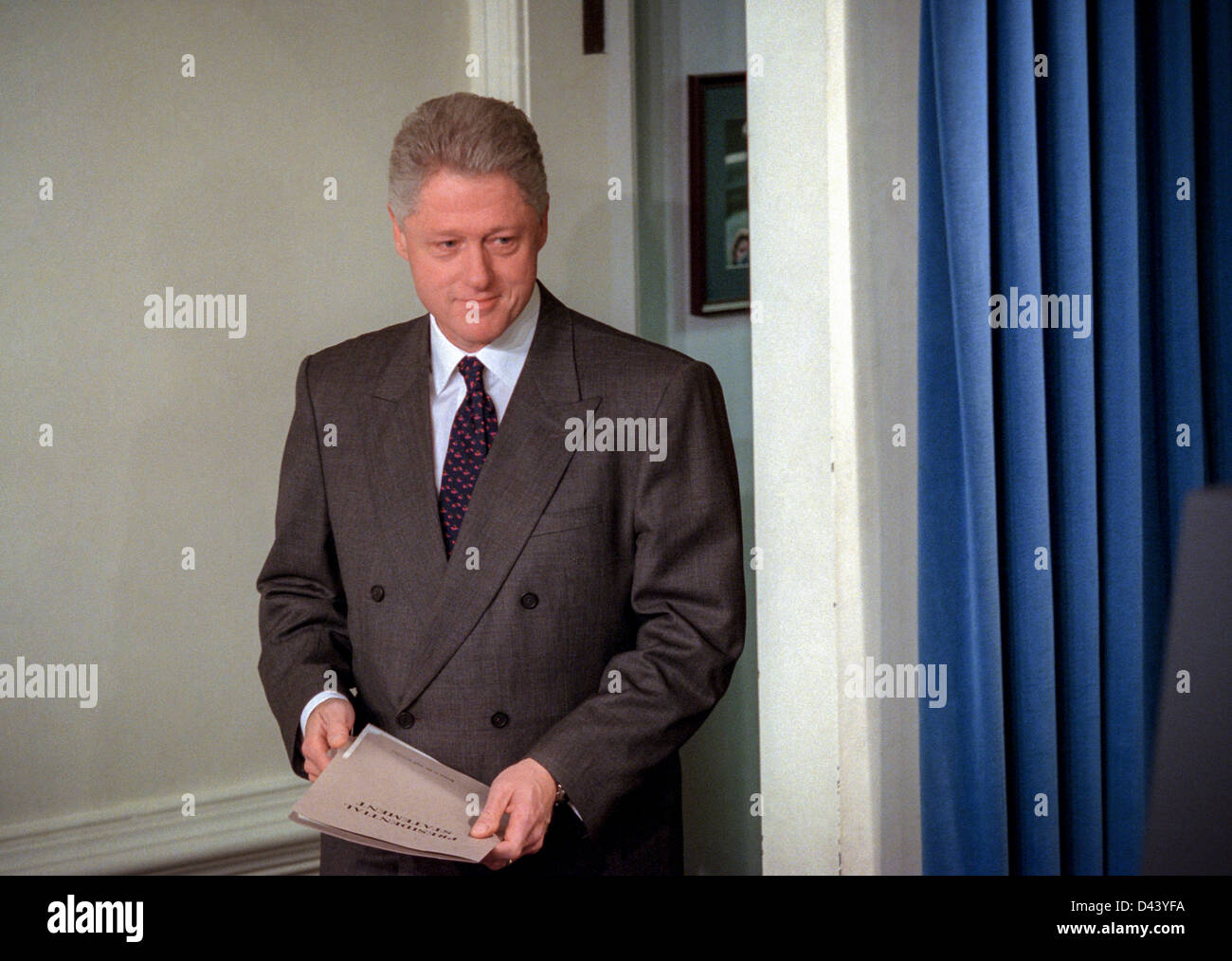 US President Bill Clinton walks to the podium in the Briefing Room of ...