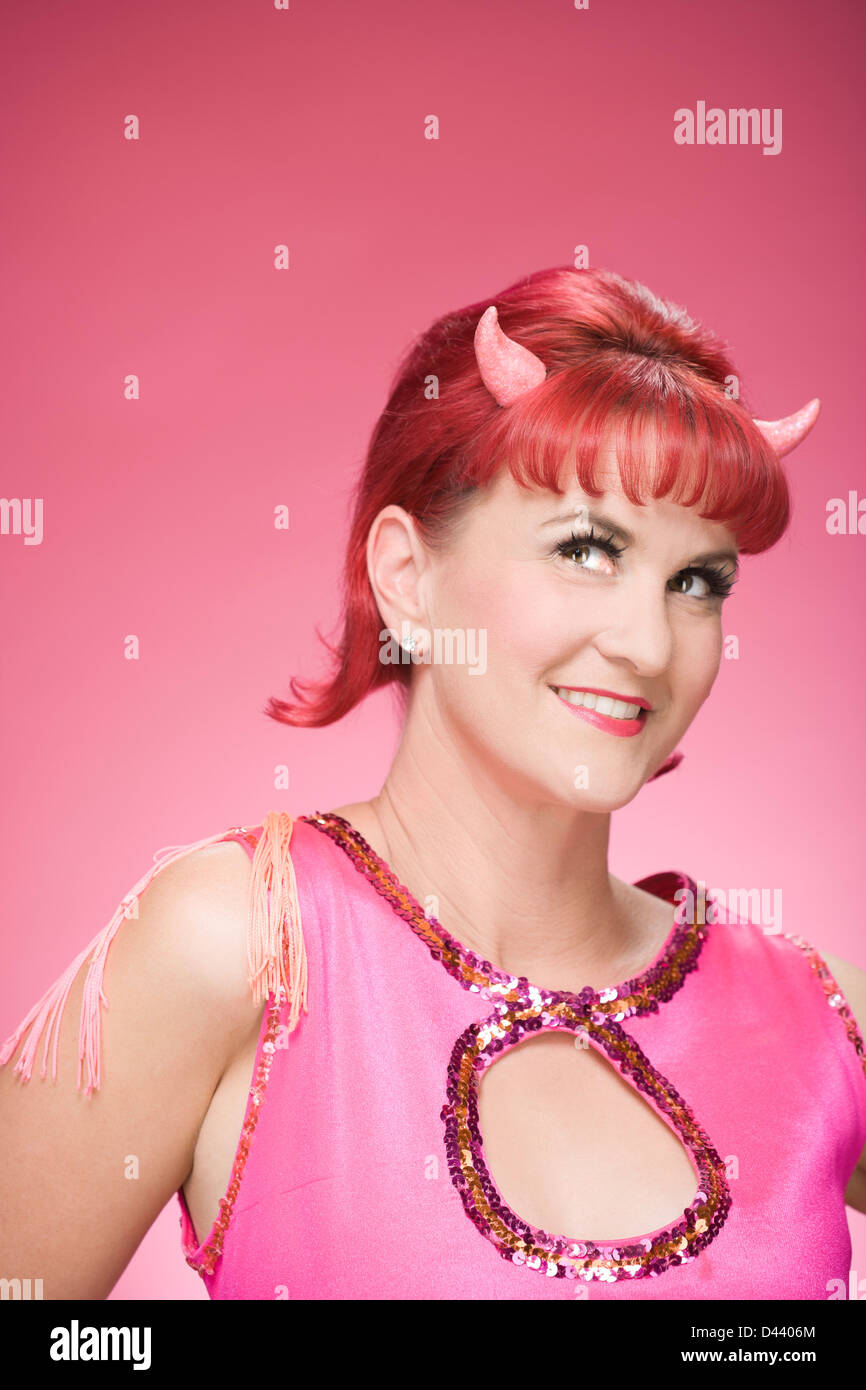 Portrait of Woman Wearing Devil Horns Stock Photo - Alamy