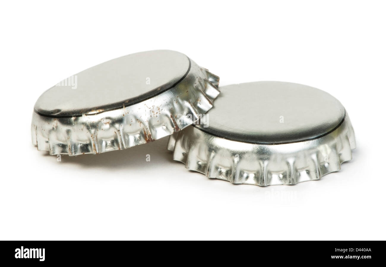 Beer caps white isolated studio shot. Close up metal cap Stock Photo ...