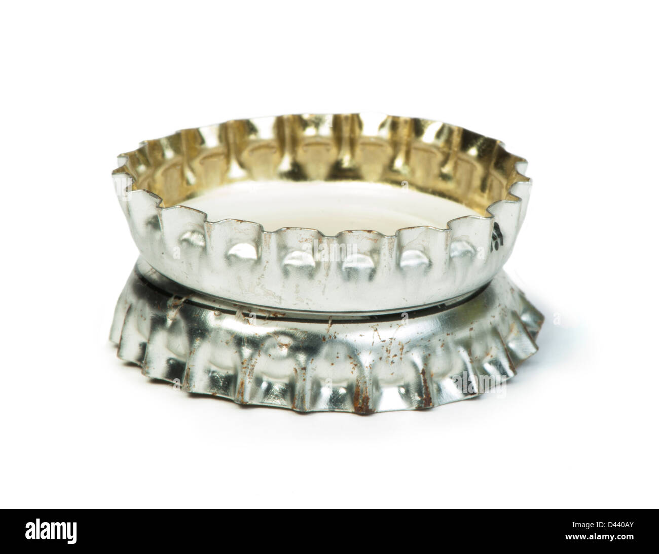 Beer caps white isolated studio shot. Close up metal cap Stock Photo ...