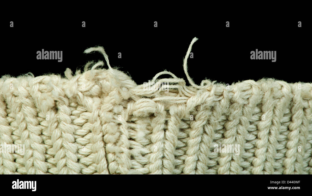 Old knit sweater background. Beige color. Studio shot Stock Photo - Alamy
