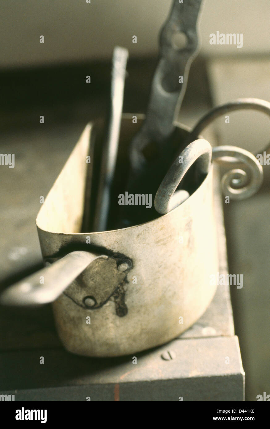 Collection of blacksmith's tools in metal pan Stock Photo - Alamy