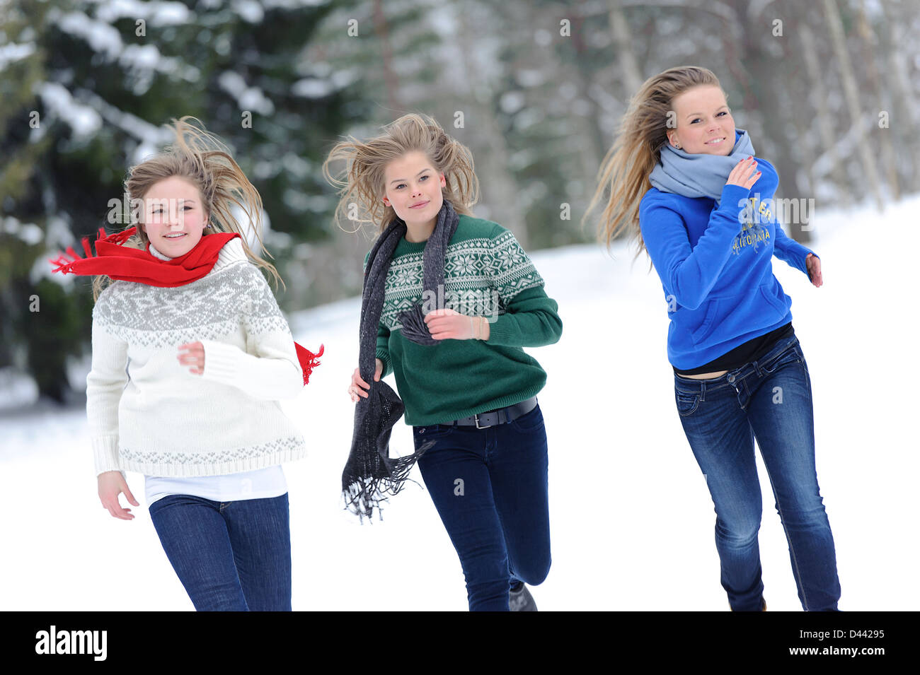 Three girls laughing hi-res stock photography and images - Alamy