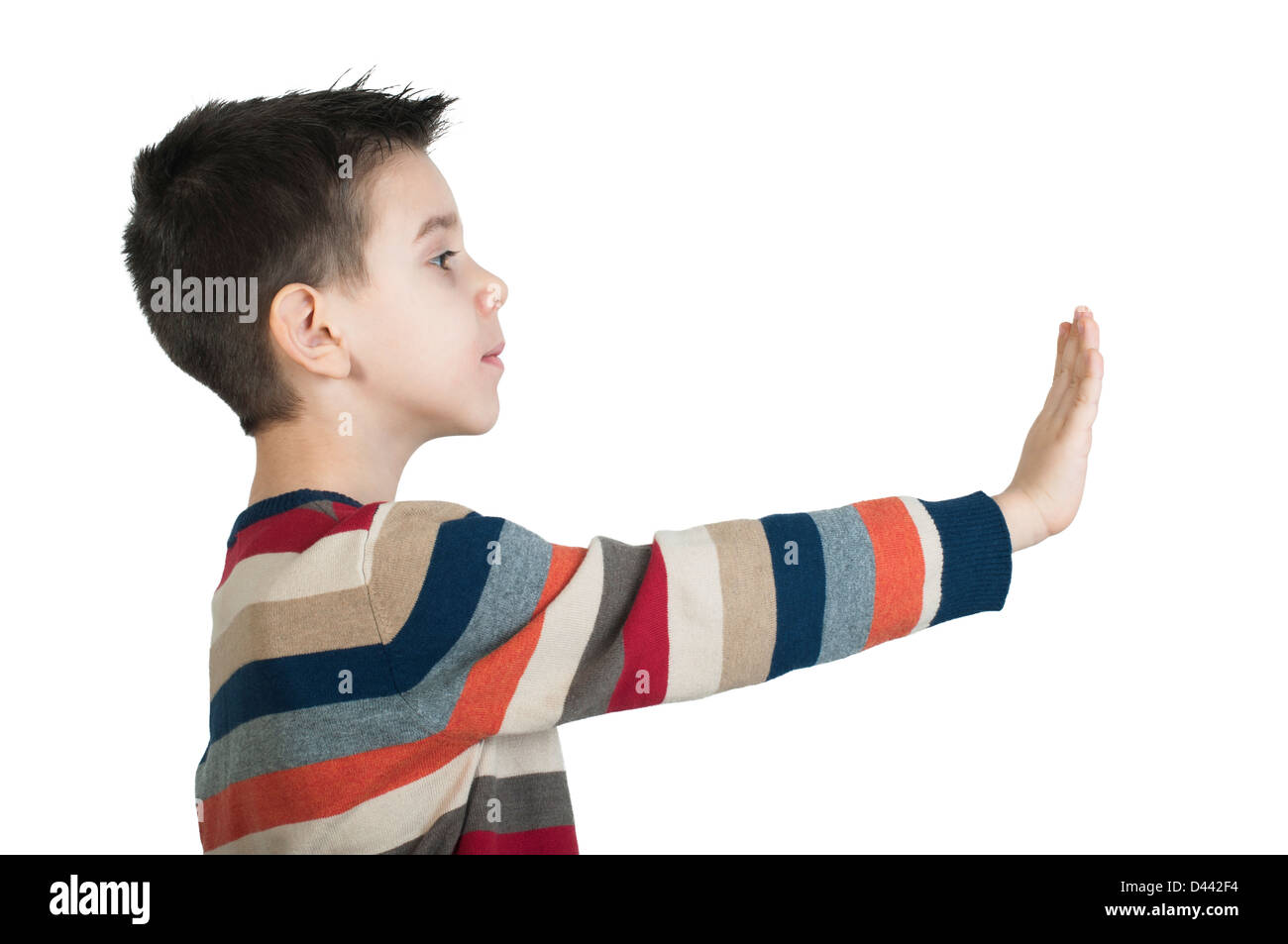 Child showing stop symbol. Profile position Stock Photo - Alamy