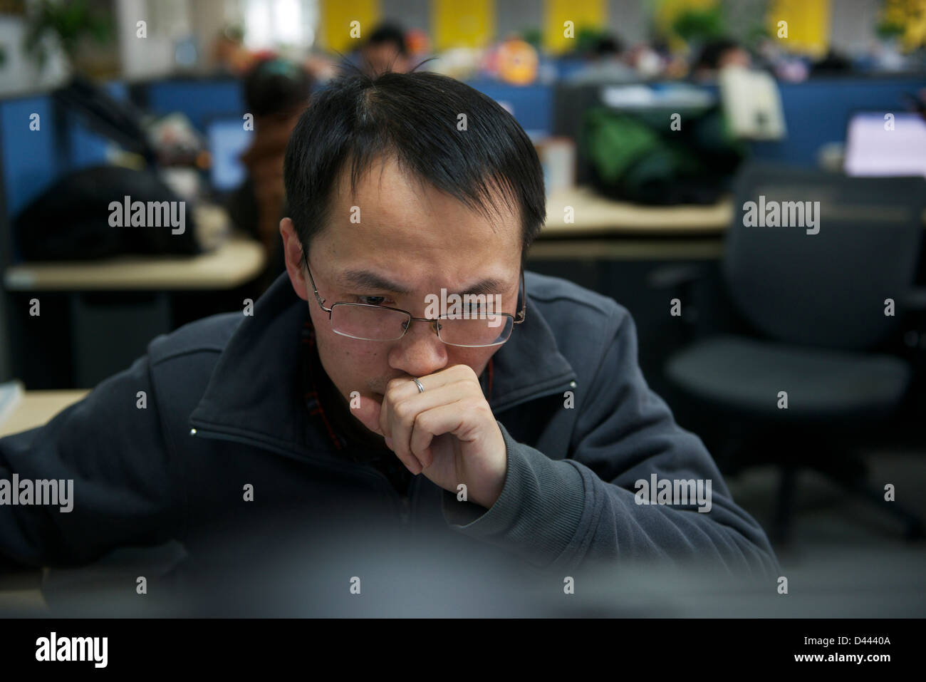Chinese editor work at Sina's Weibo microblog office in Beijing, China ...