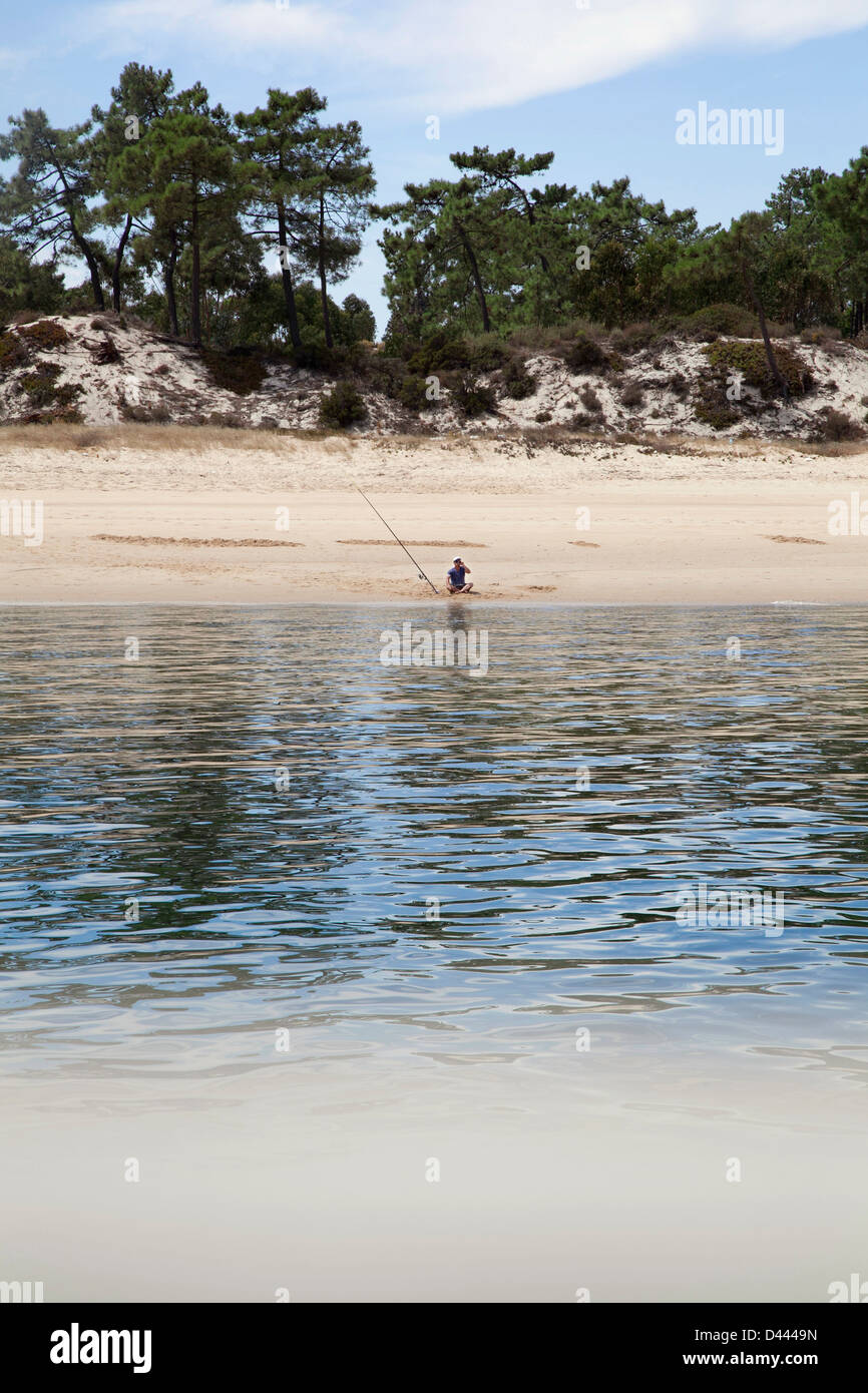 Ocean beach fisherman fishing hi-res stock photography and images - Alamy